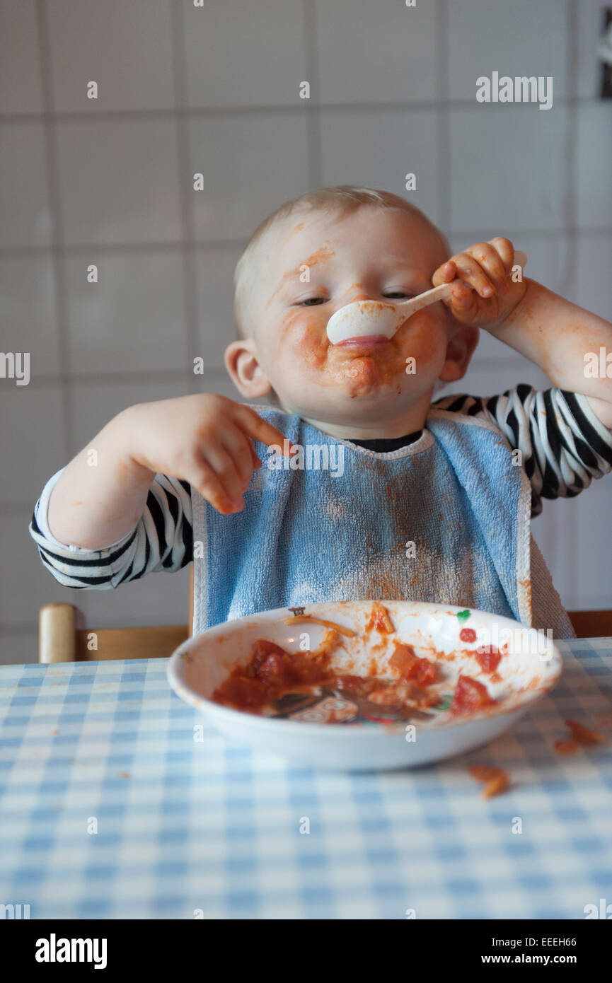 Freiburg, Germany, little kid eating Stock Photo - Alamy