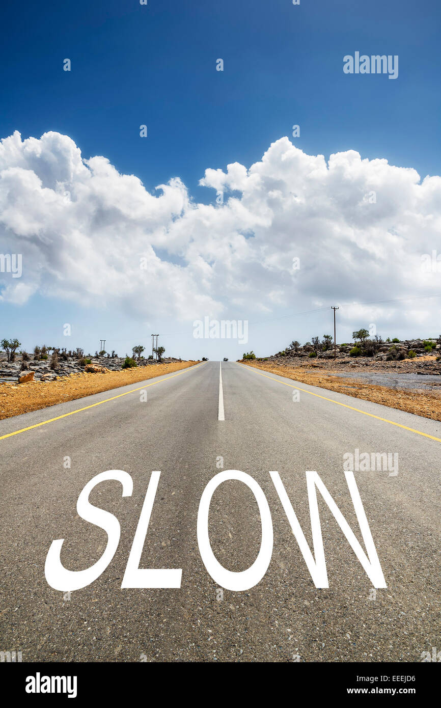Road marking slow hi-res stock photography and images - Alamy