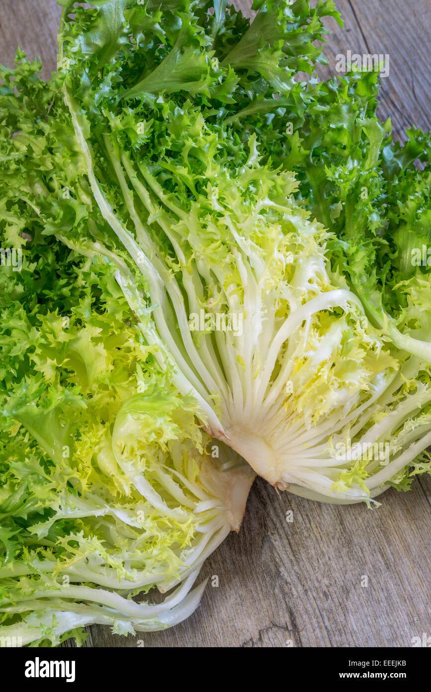 curly salad rotating on white background Stock Photo - Alamy