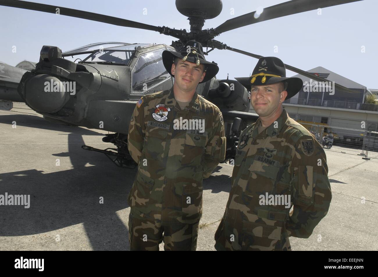 crew of an US Army Apache anti tank combat helicopter with cavalry hat ...