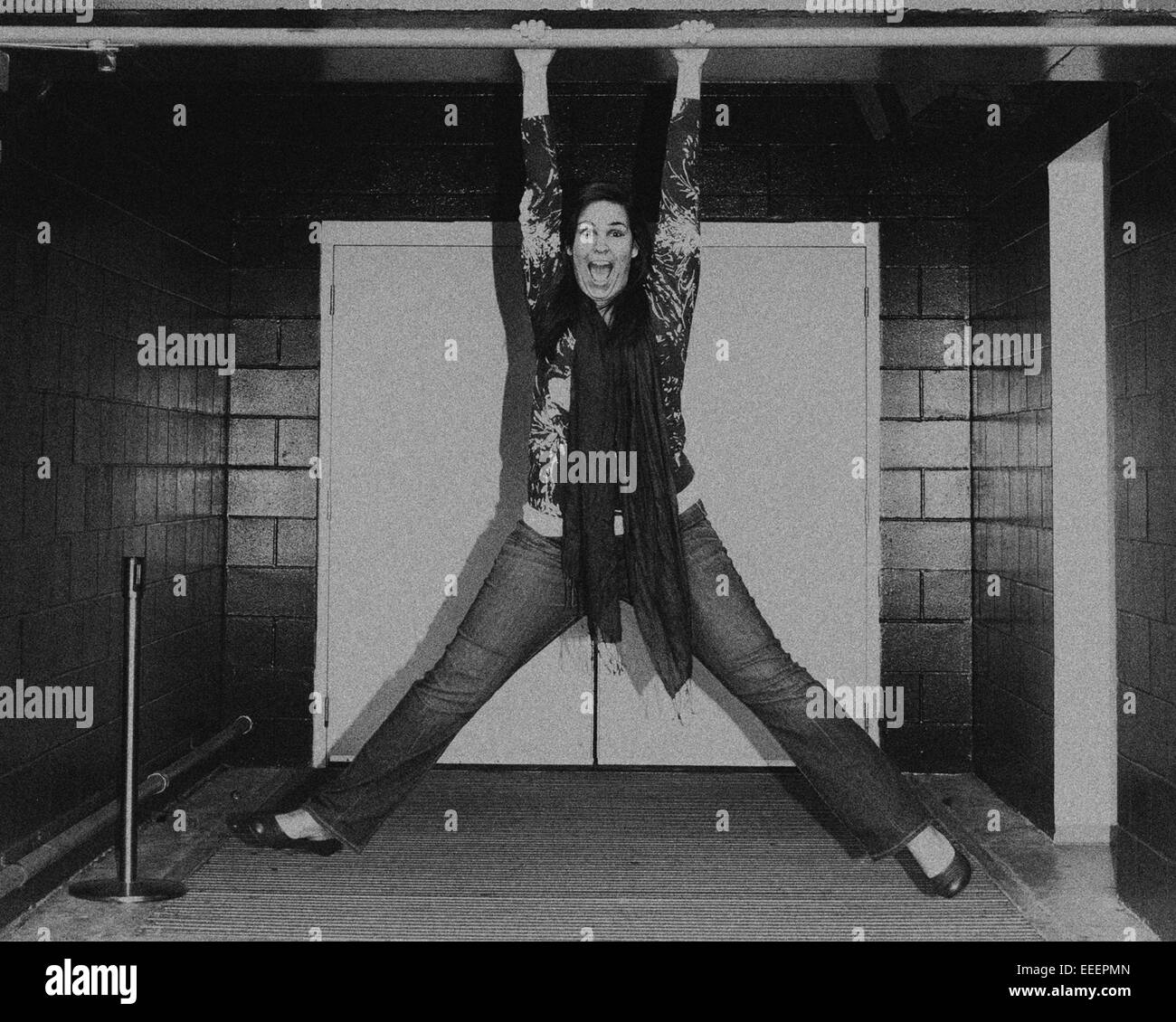 Exuberant young woman! Grungy Stock Photo - Alamy