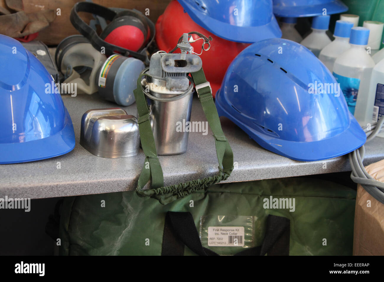 Self-rescuer and hard hats in a display of personal protection ...