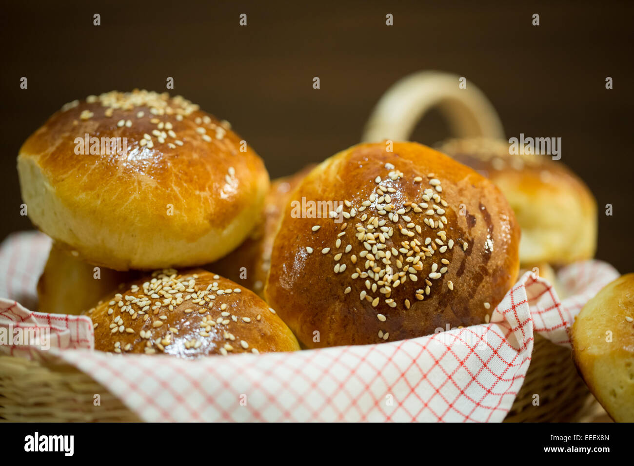 Small buns ready to eat and served with milk Stock Photo - Alamy