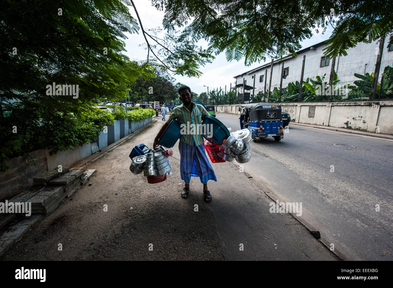 A peddler of household goods in the street in Colombo, Sri Lanka Stock ...