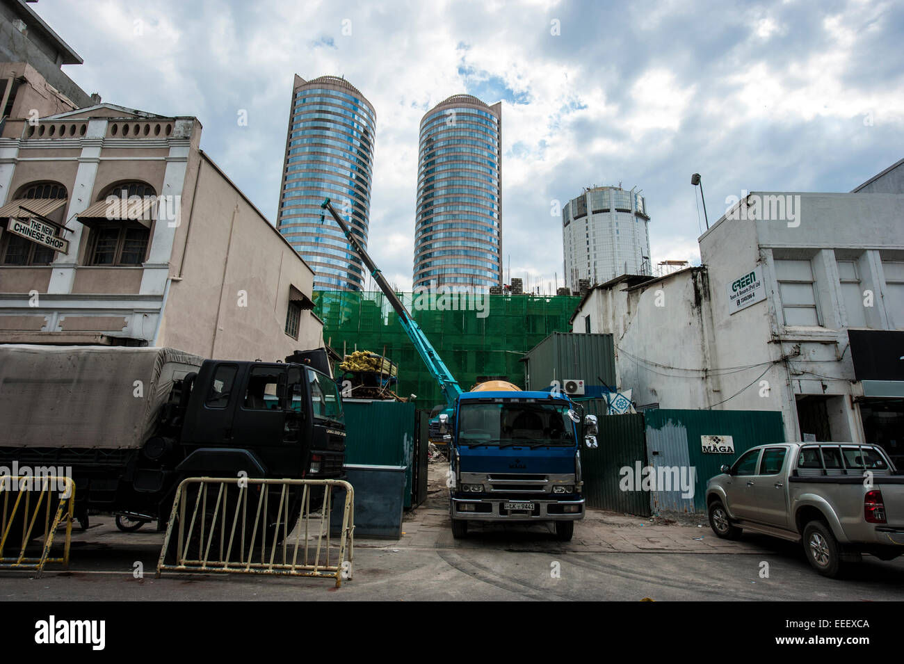 Backstreets of Colombo, Sri Lanka, and two twin towers of the Sri ...
