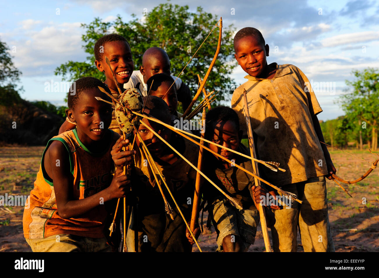 TANZANIA, Kondoa, children of Sandawe a hunter tribe play with bow and ...