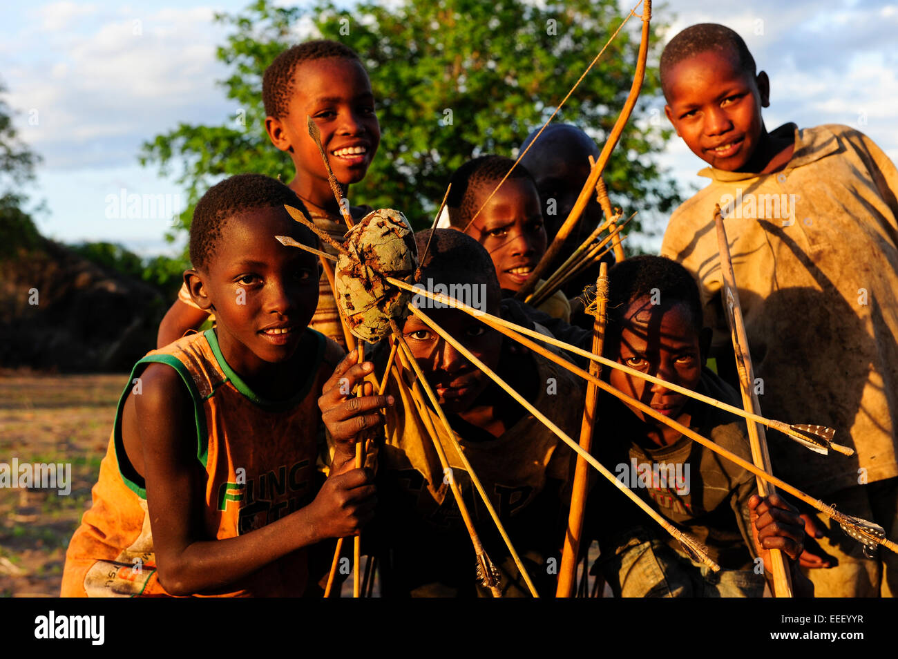 TANZANIA, Kondoa, children of Sandawe a hunter tribe play with bow and ...