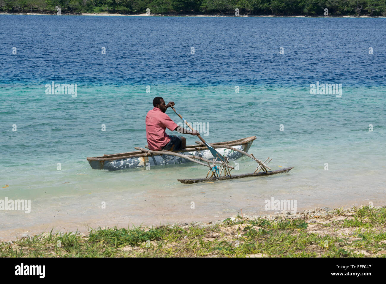 Melanesia, Vanuatu, Rano Island. Village man in traditional wooden ...