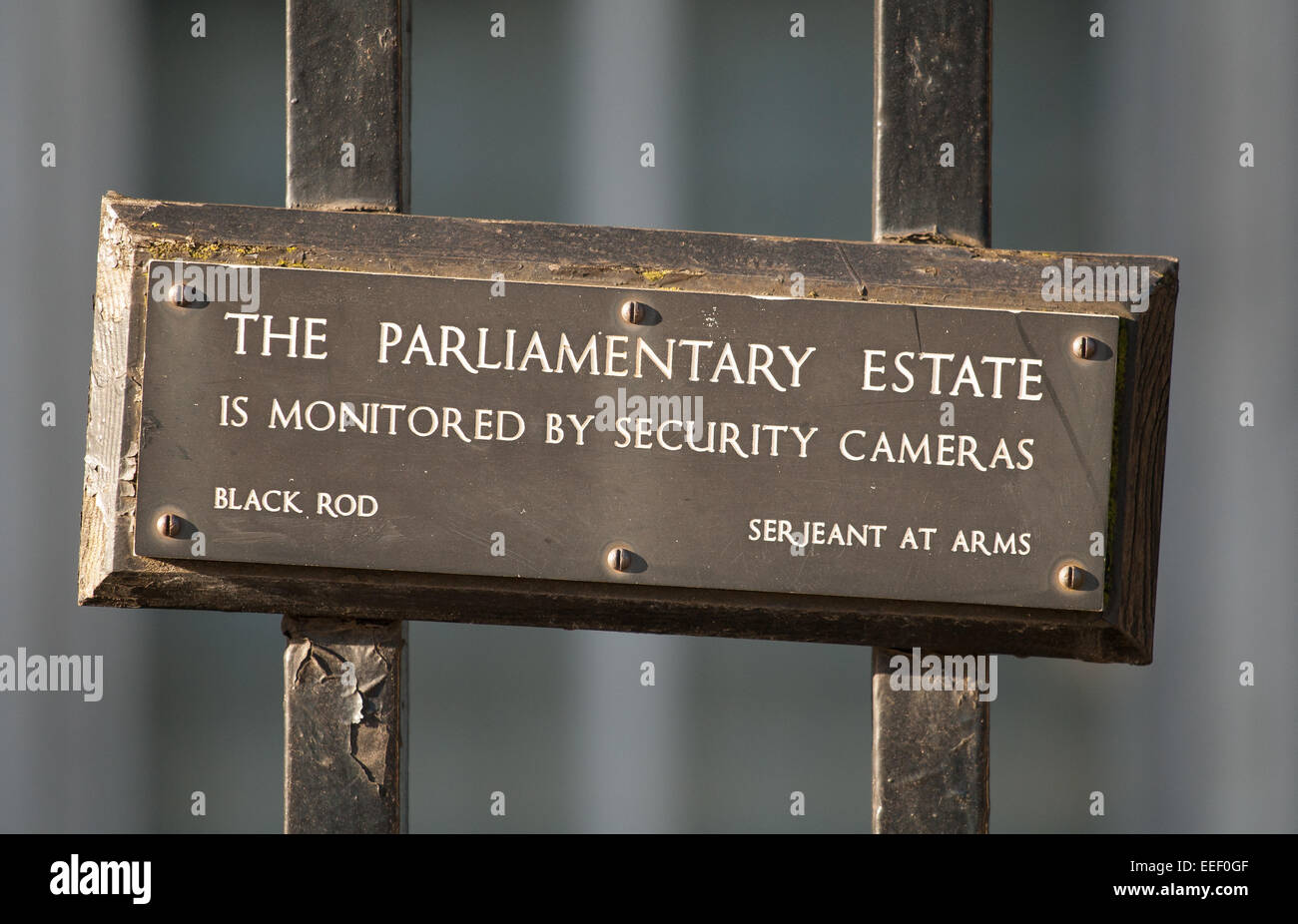 A sign reads 'THE PARLIAMENTARY ESTATE IS MONITORED BY SECURITY CAMERAS ...