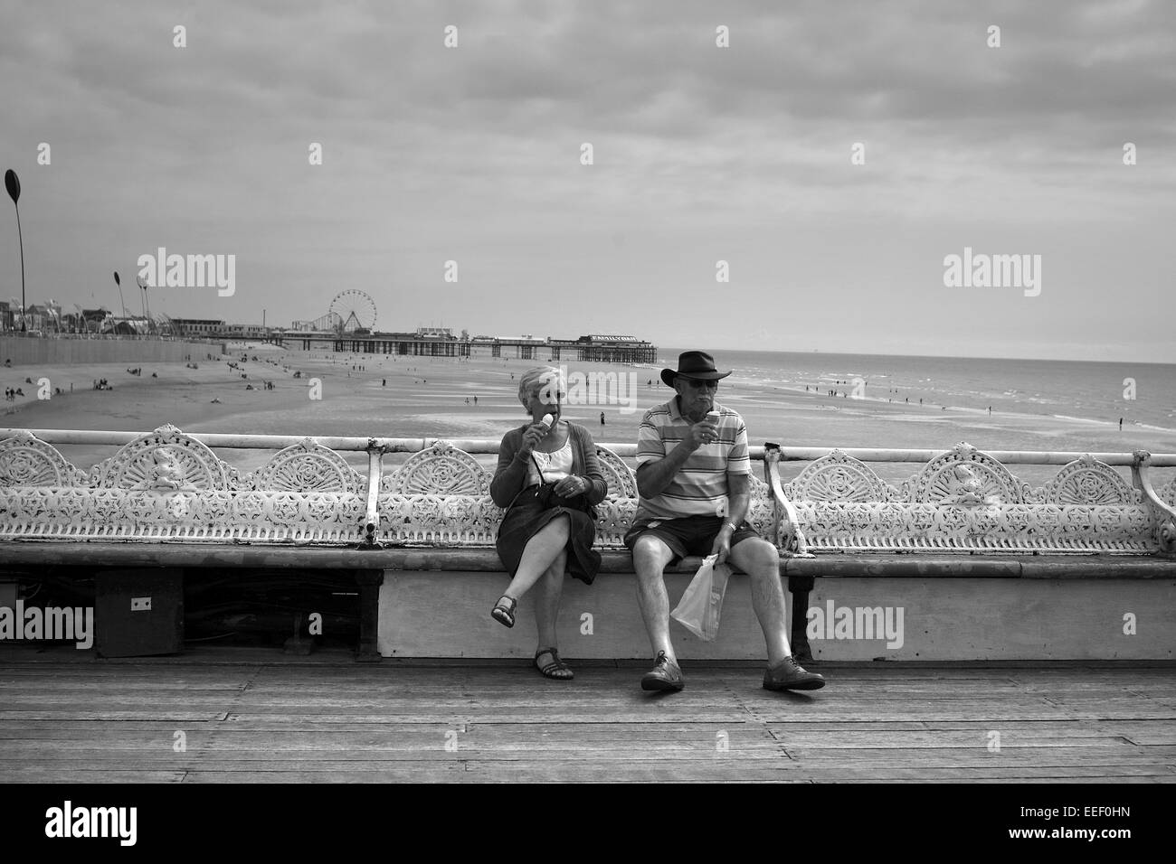 Having an ice cream, Blackpool North Pier Stock Photo - Alamy
