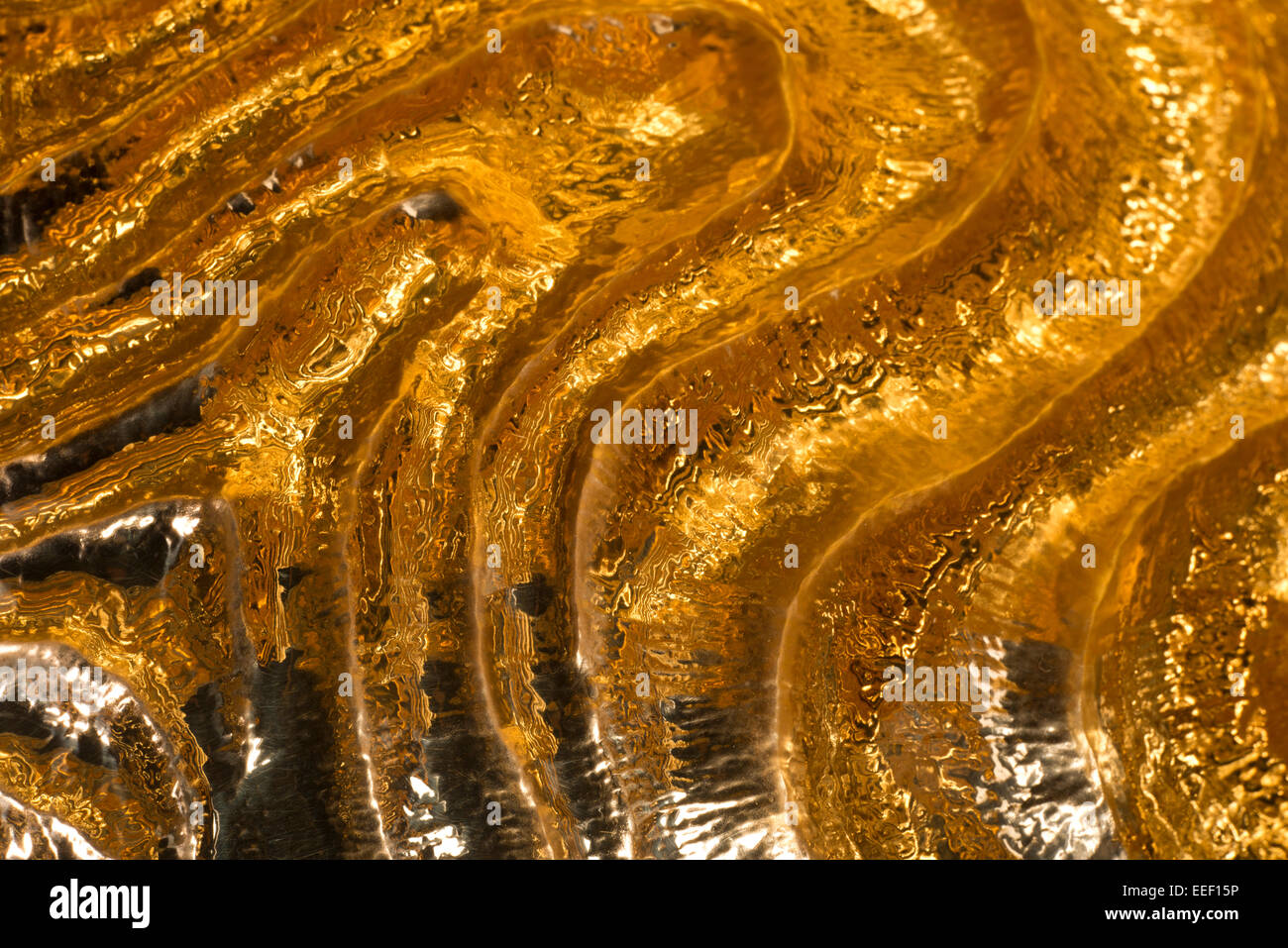 Beaten, rippled sterling silver gilt silverware. Designer silversmith ...