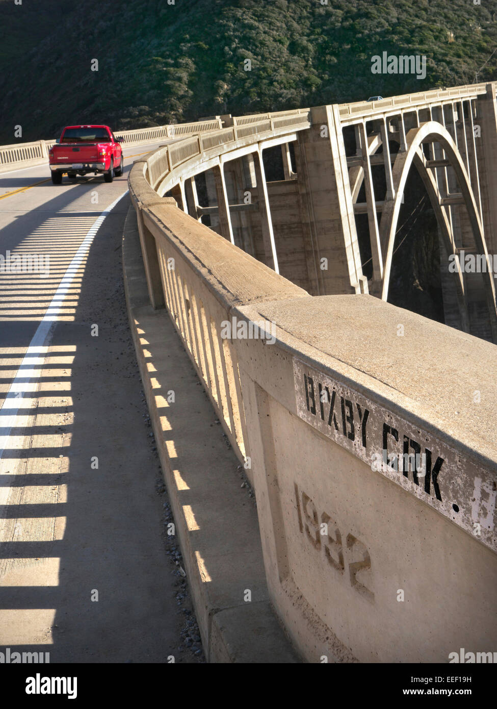 Red American pick-up truck crossing Bixby Bridge at Big Sur Highway 1 ...
