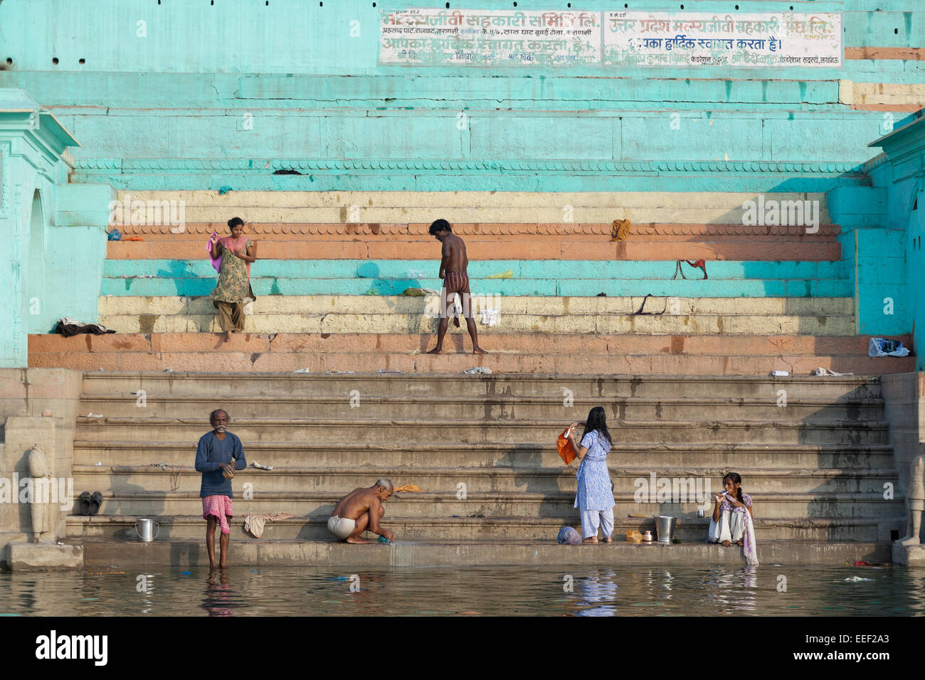 Indian man bathing washing clothes hi-res stock photography and images ...