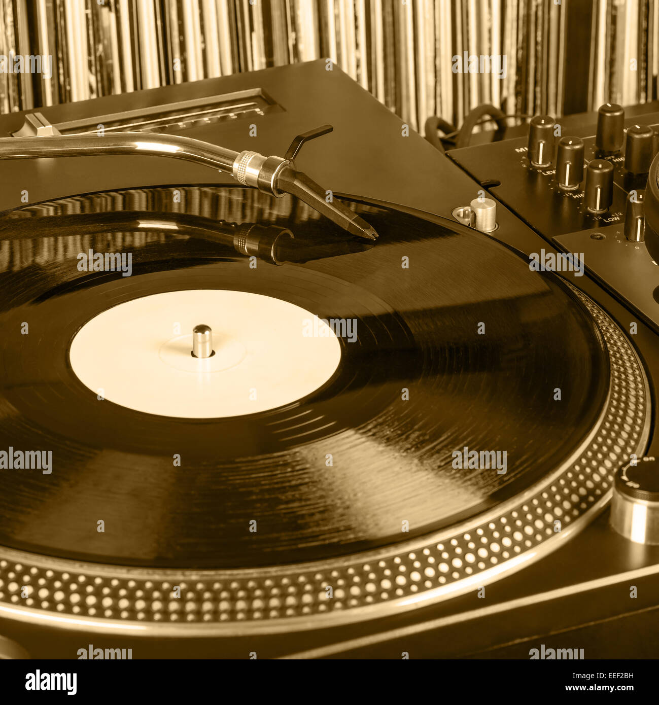 Dj needle stylus on spinning record, vinyl background Stock Photo - Alamy