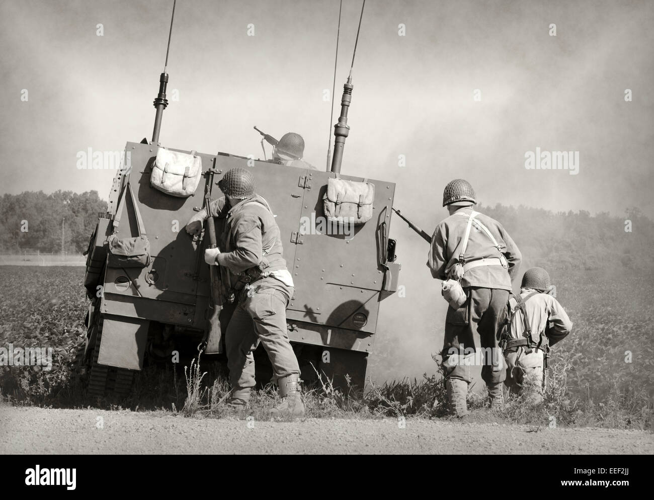 Soldiers in World War II era battle Stock Photo - Alamy