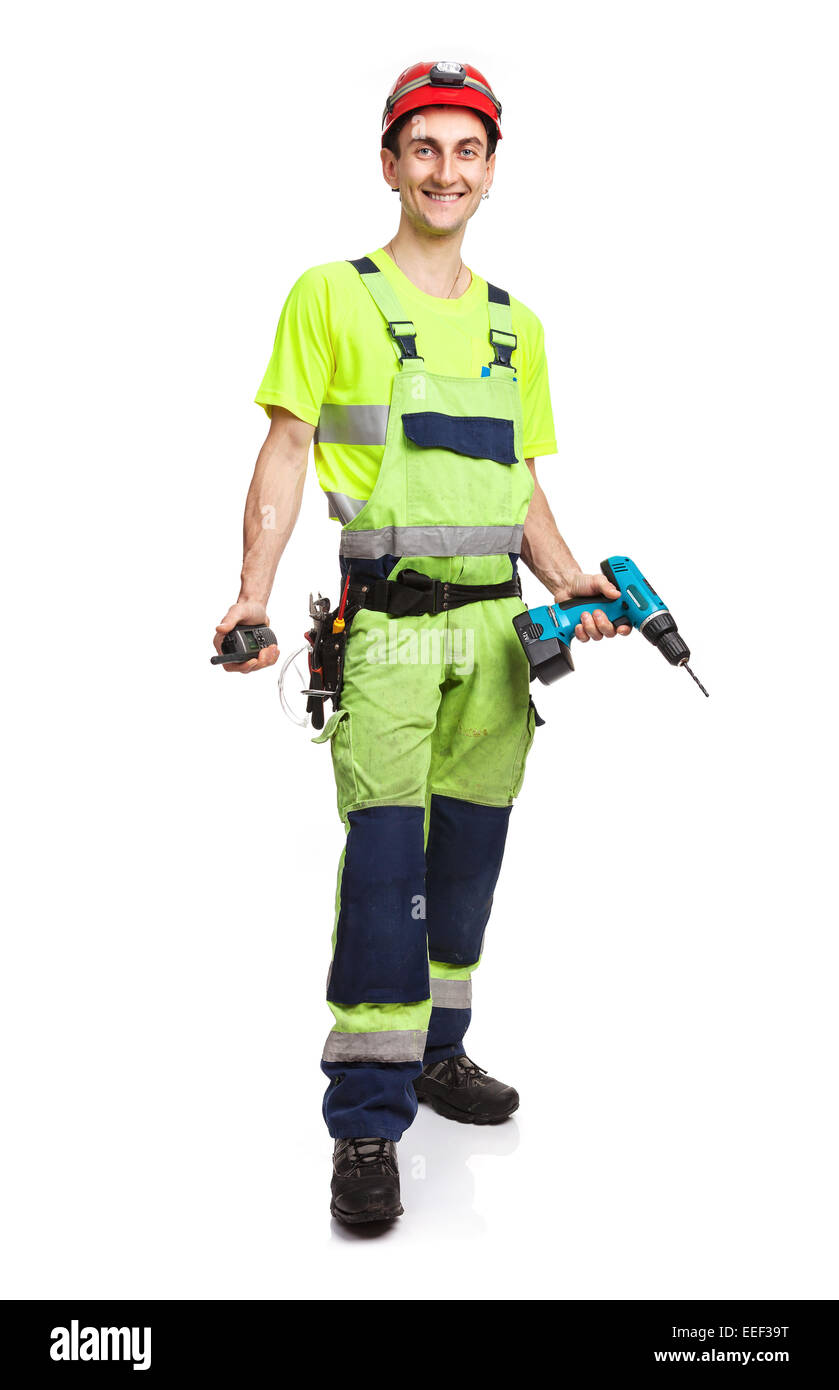 Young handsome contractor holding electric screwdriver and walkie ...