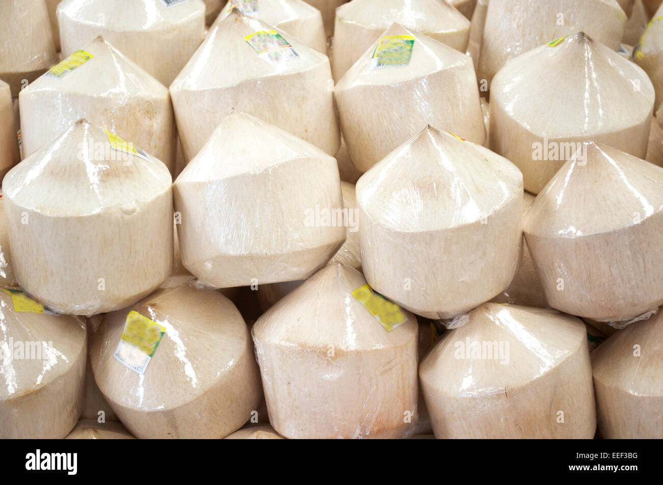 Cored Coconut Shrink Wrapped Stock Photo - Alamy