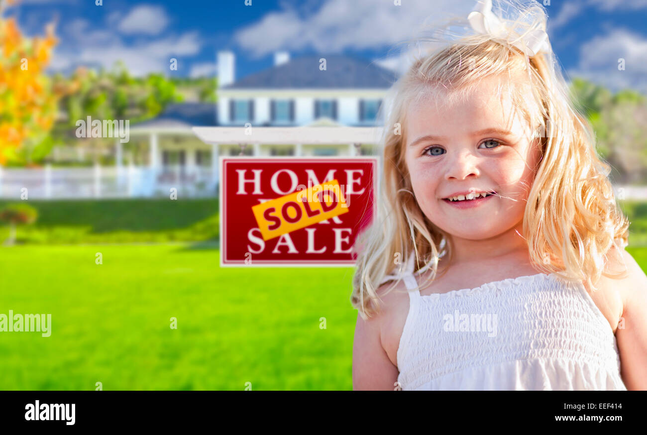Cute Smiling Girl in Front Yard with Sold For Sale Real Estate Sign and ...
