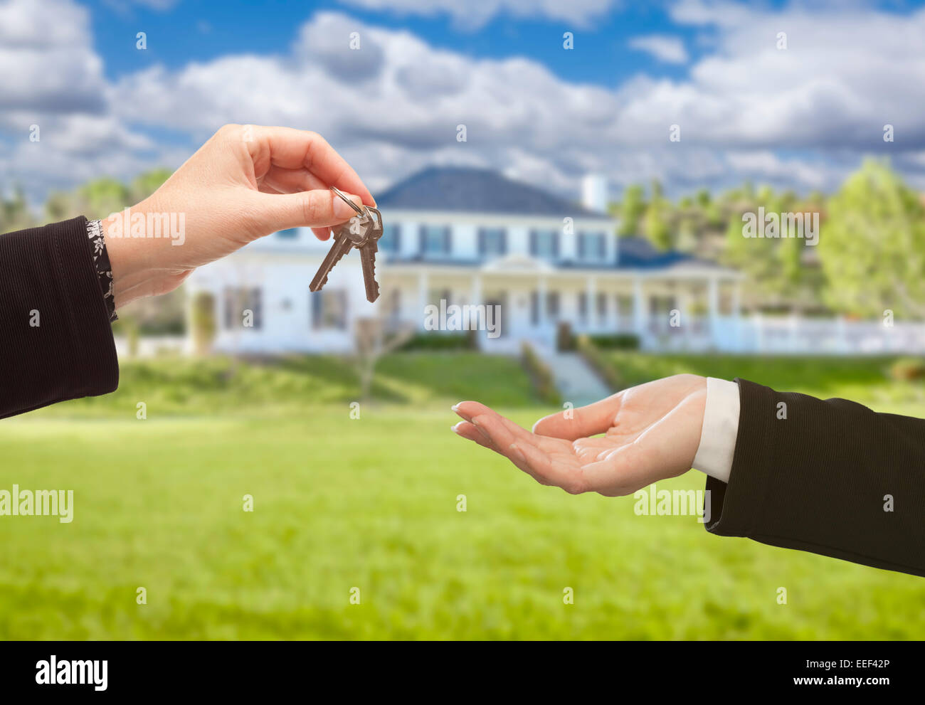 Handing over house keys hi-res stock photography and images - Alamy