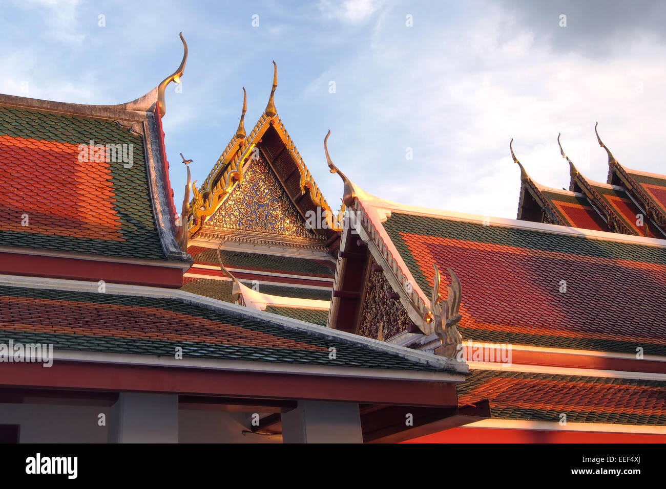 gable apex on temple roof with blue sky background Stock Photo - Alamy