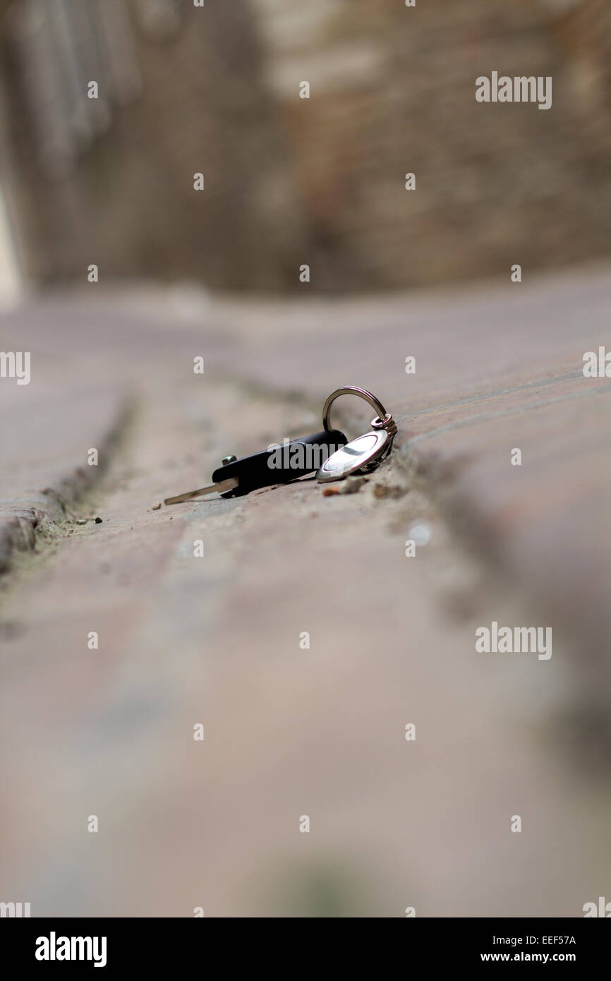 keys falling into the ground Stock Photo - Alamy