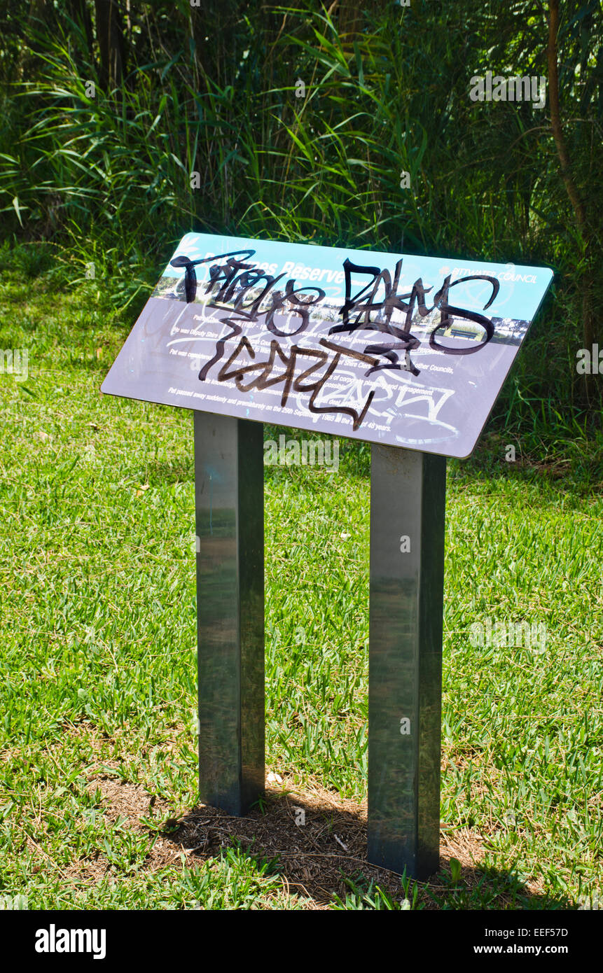 graffiti on information plaque at Pat Hynes Reserve ,Narrabeen NSW ...