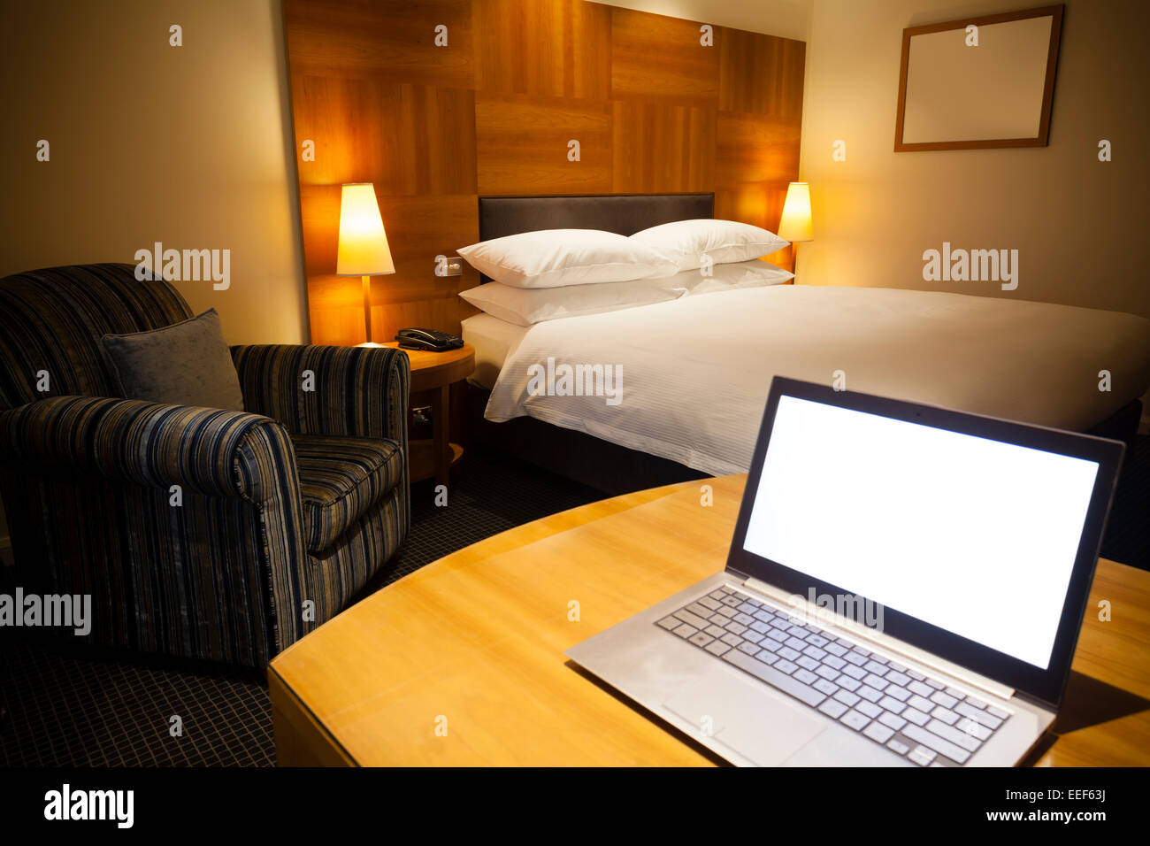 Laptop in a luxurious hotel room Stock Photo - Alamy