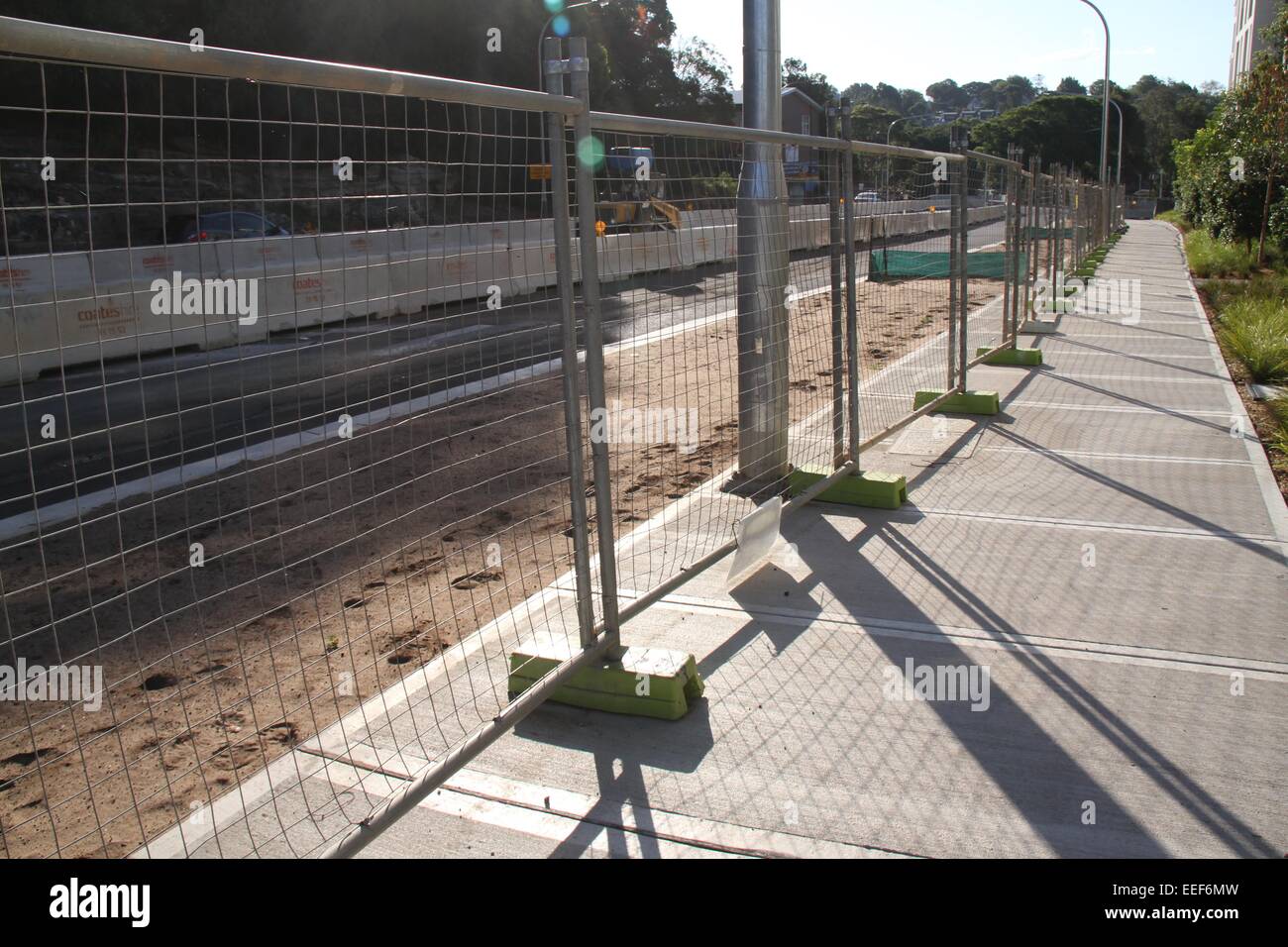 A long metal fence next to a long footpath in Forest Lodge in Sydney’s ...