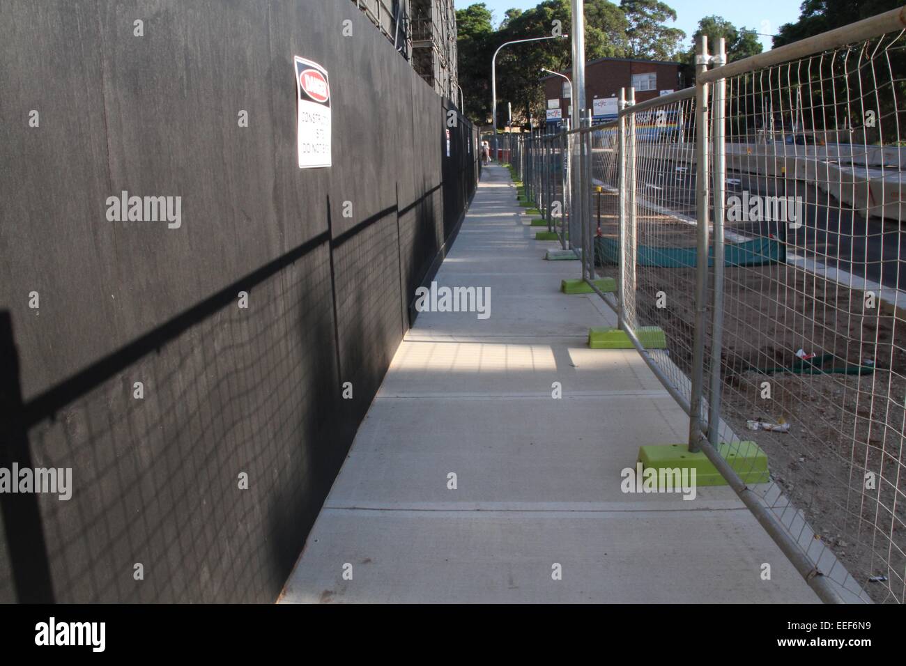 A long metal fence alongside a long footpath in Forest Lodge in Sydney ...