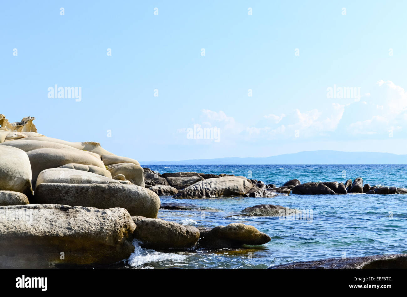 Strange oval rocks by the sea in a beautiful sunny day Stock Photo - Alamy