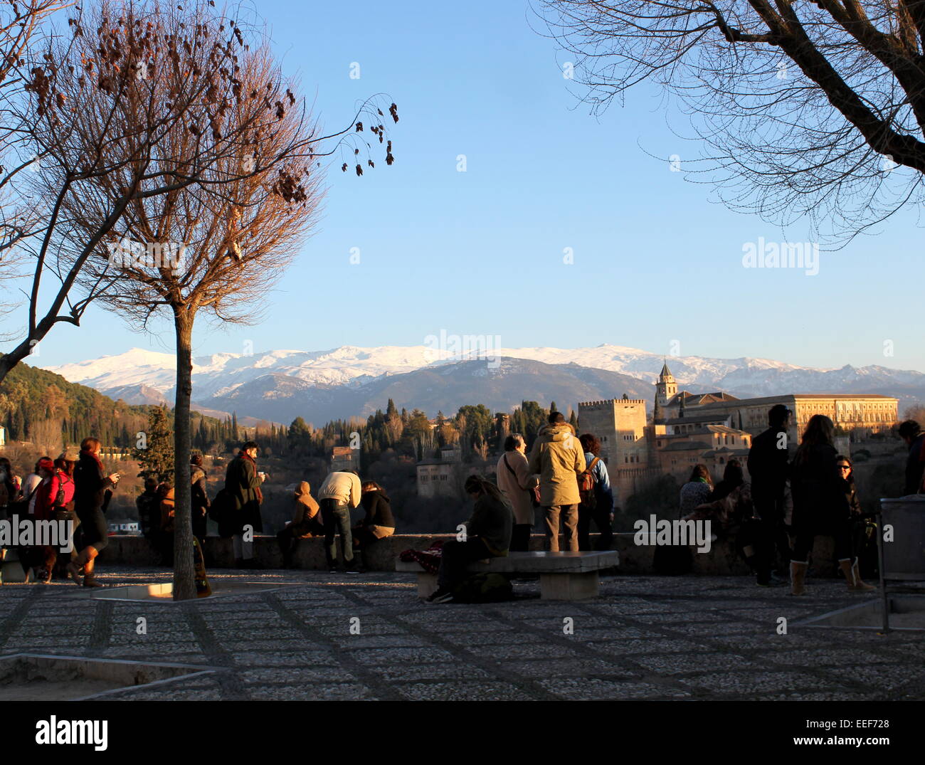 Tourists on Albaicín hill admiring the Alhambra palace & fortress in ...