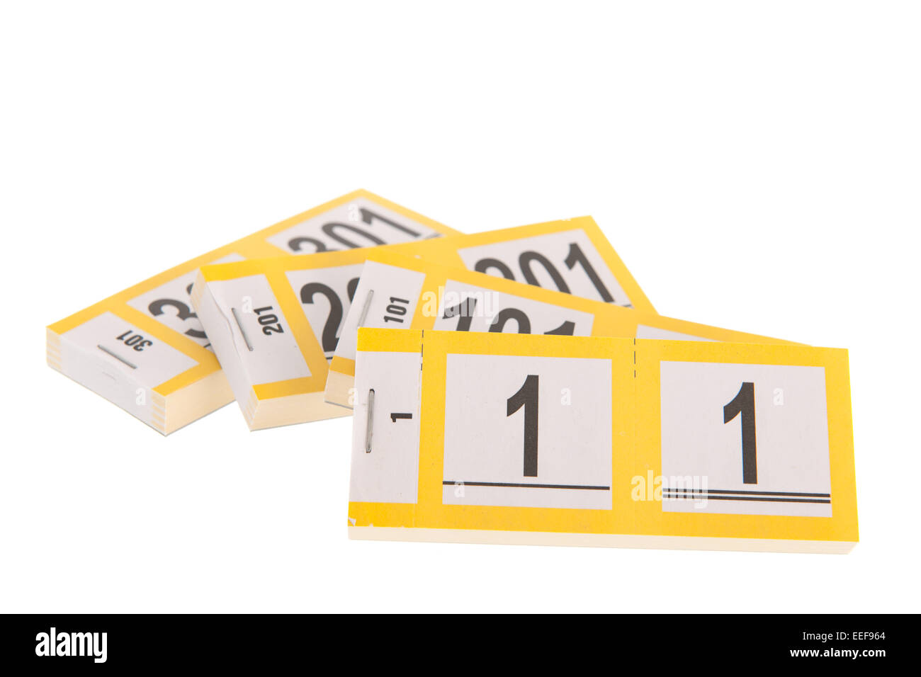 cloakroom tickets isolated over white background Stock Photo - Alamy