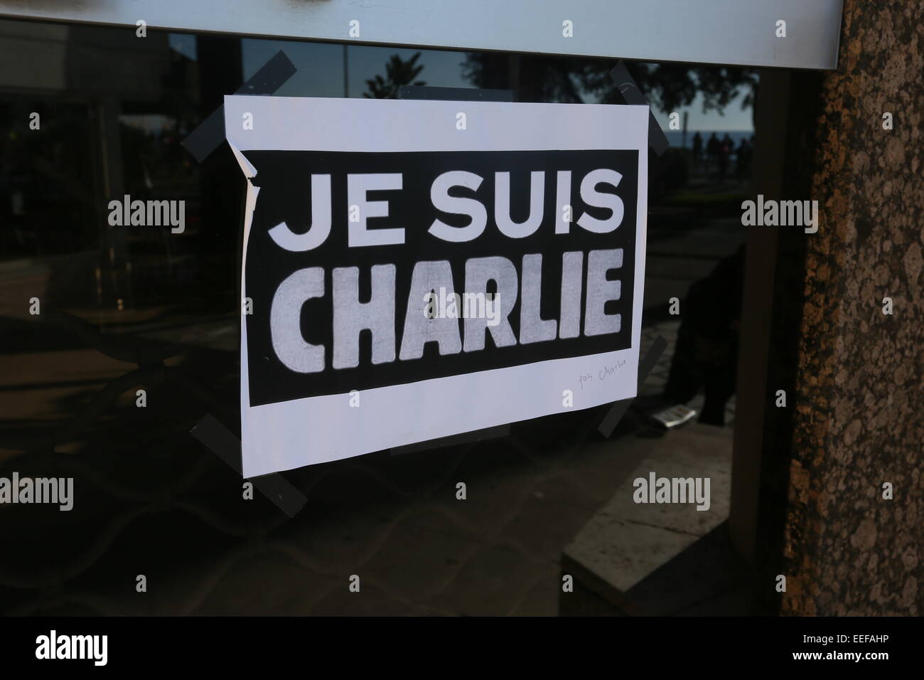 A 'Je Suis Charlie' sign on the door of the tourist office in Nice ...