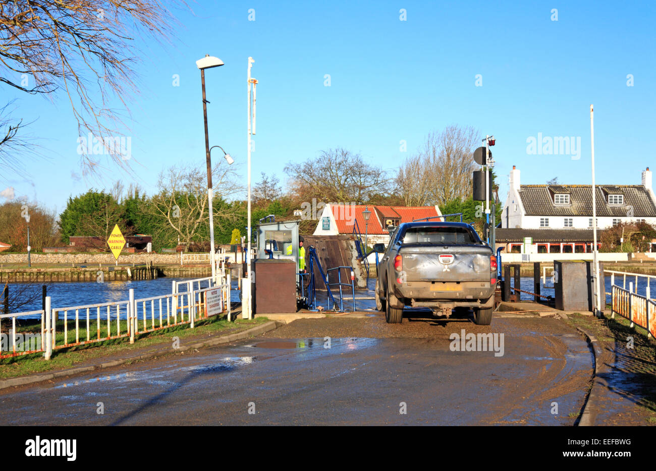 A view of a vehicle boarding Reedham Ferry on the River Yare on the ...