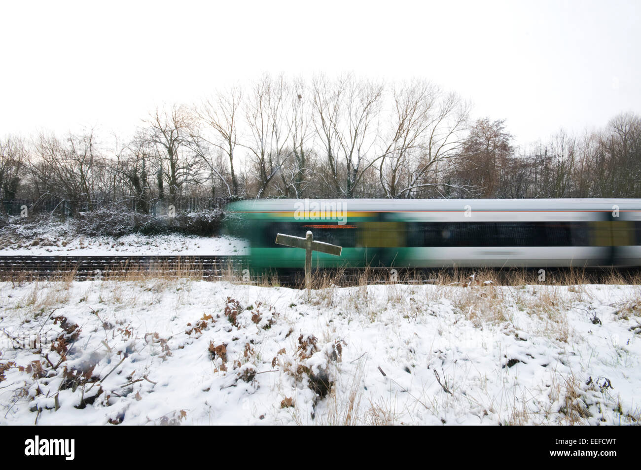 Trains in England travel despite the snow and bad weather Stock Photo ...