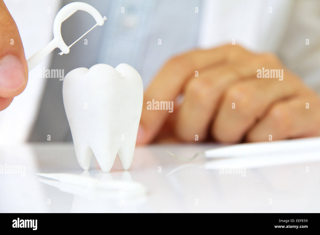 flossing teeth concept Stock Photo - Alamy