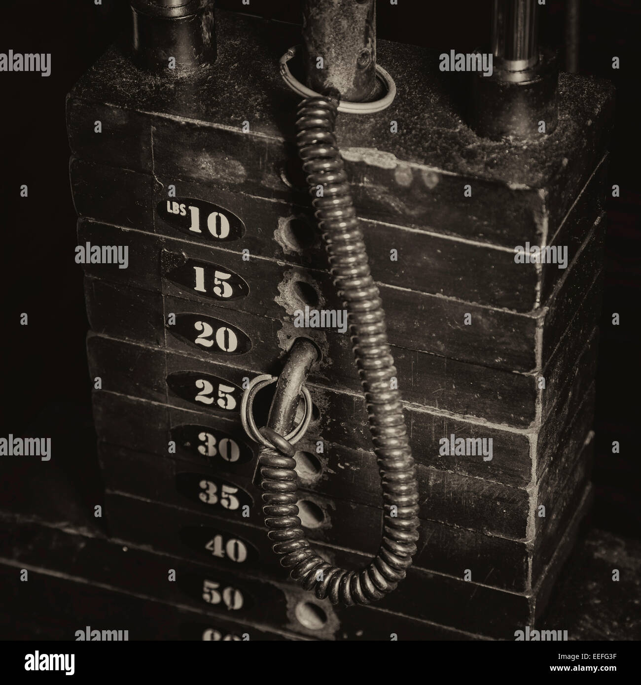 Antique tones on an old rusty weight stack in a gym Stock Photo - Alamy