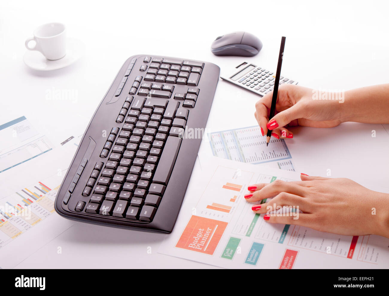 Keyboard on office desk used by a businesswoman Stock Photo - Alamy