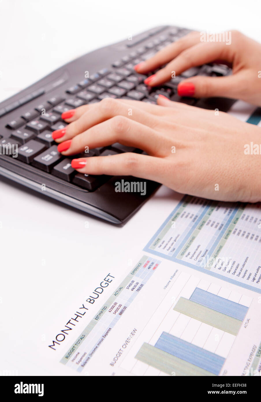 Keyboard on office desk used by a businesswoman Stock Photo - Alamy