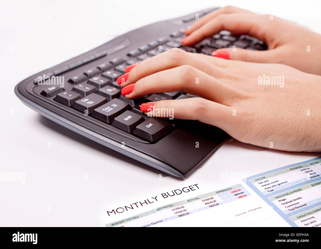 Keyboard on office desk used by a businesswoman Stock Photo - Alamy