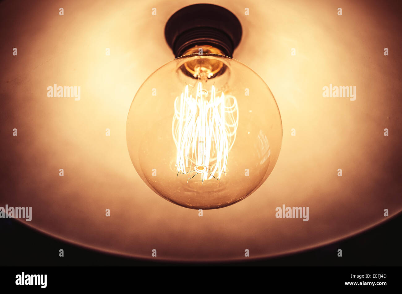 Old dusty light bulb Stock Photo - Alamy