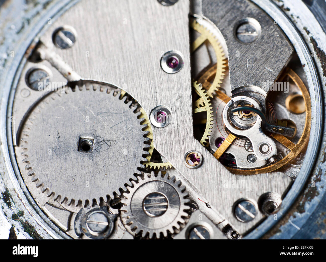 Close-up on stailess steel clock mechanism Stock Photo - Alamy