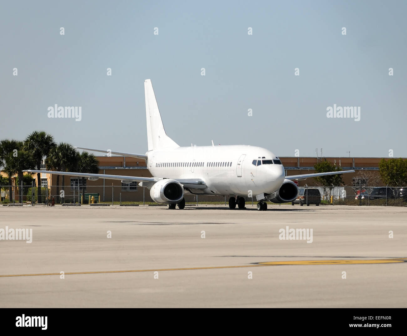 Unmarked passenger jet airplane parked on a tarmac Boeing 737 Stock ...