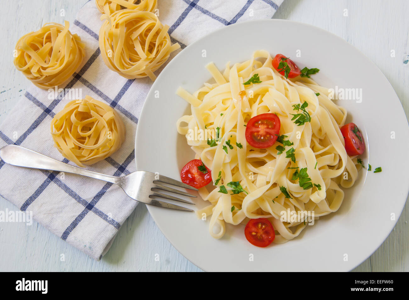 italian pasta tagliatelle with tomato and cheese sauce Stock Photo - Alamy