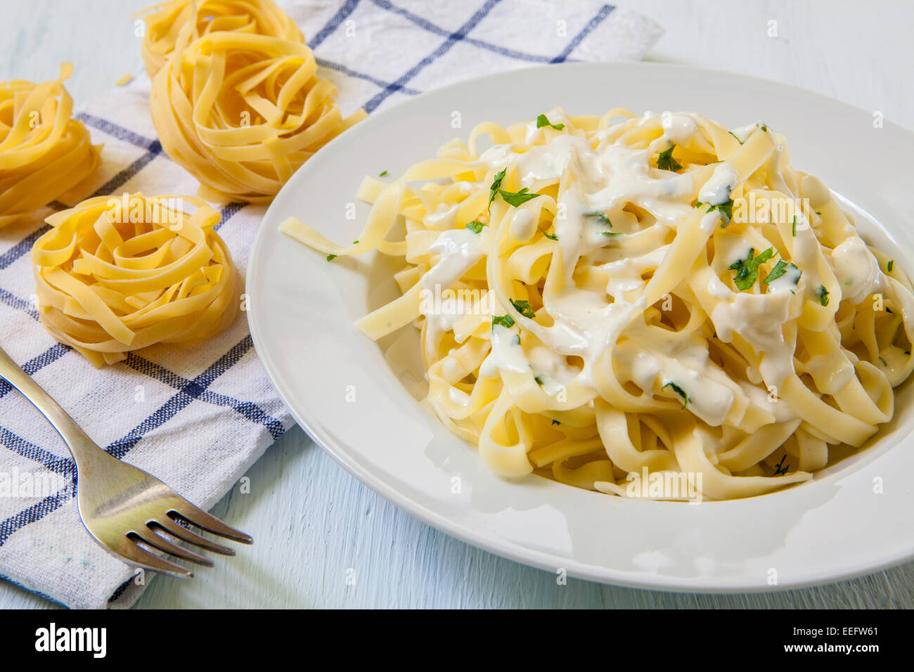 italian pasta tagliatelle with blue cheese sauce Stock Photo - Alamy