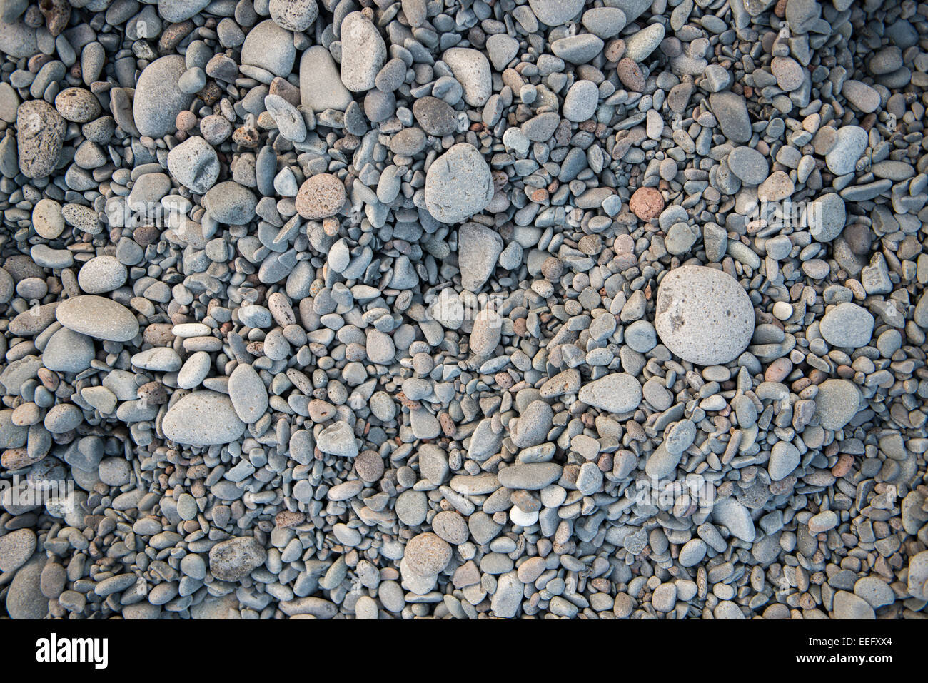 Black pebble beach Stock Photo - Alamy