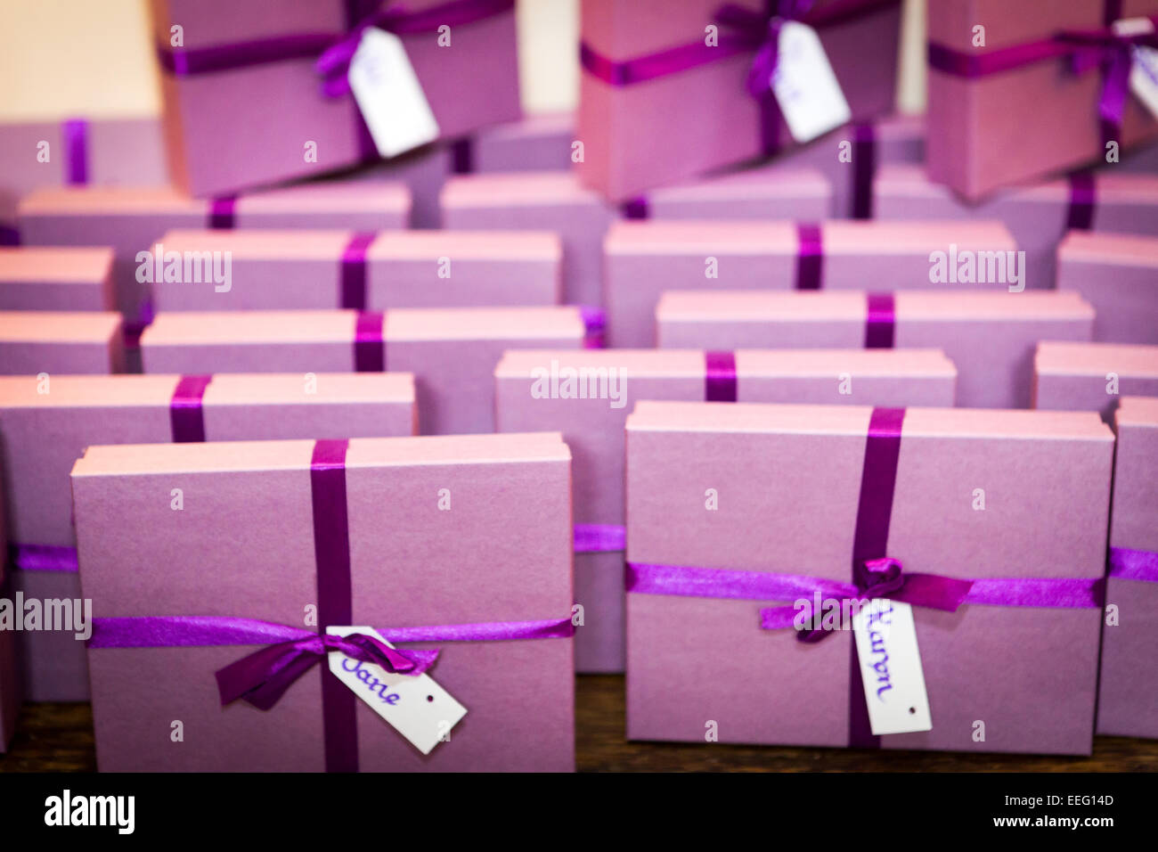Collection of named purple gift boxes with purple ribbon Stock Photo ...
