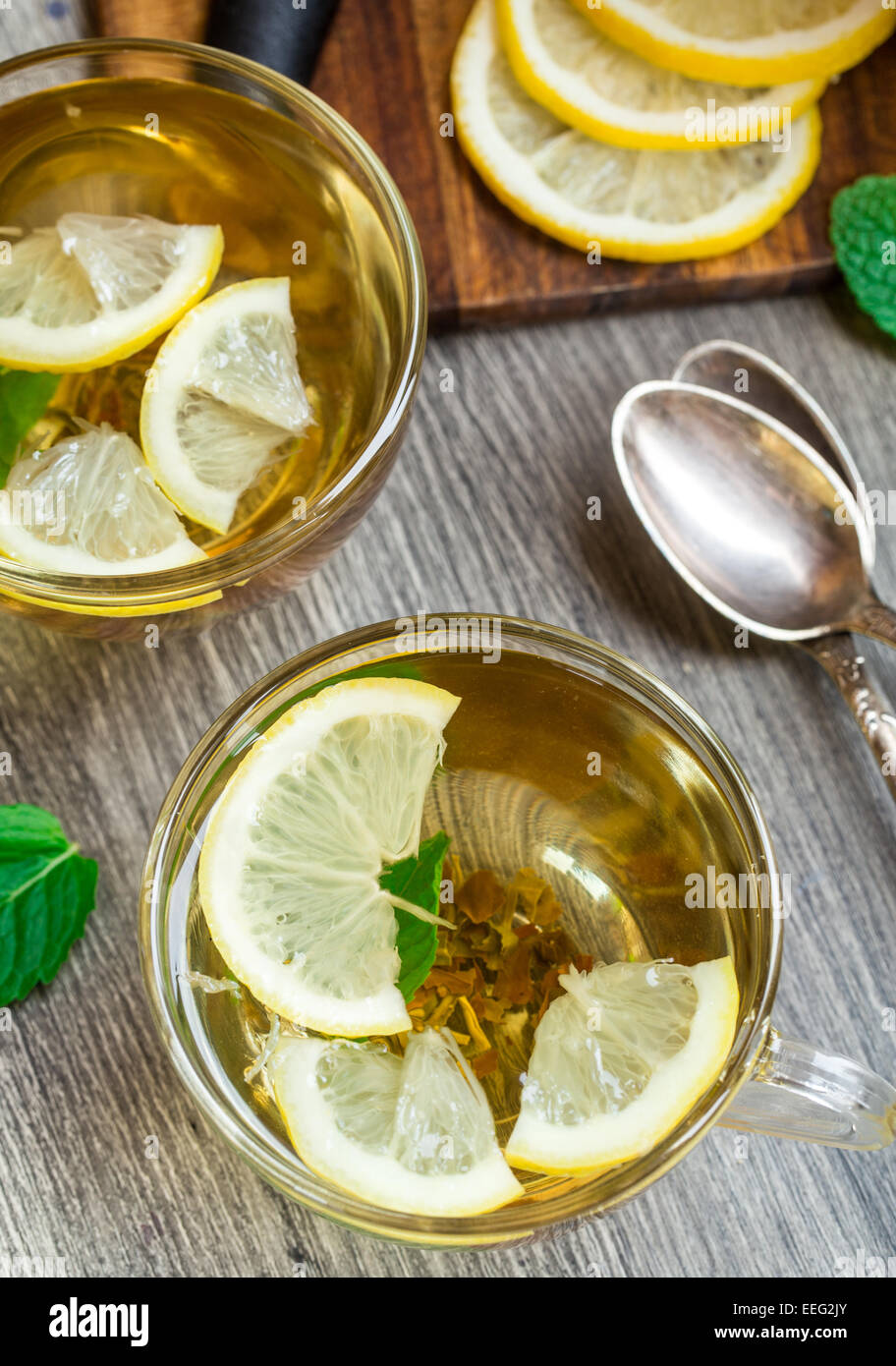 Cup with mint and lemon tea Stock Photo - Alamy