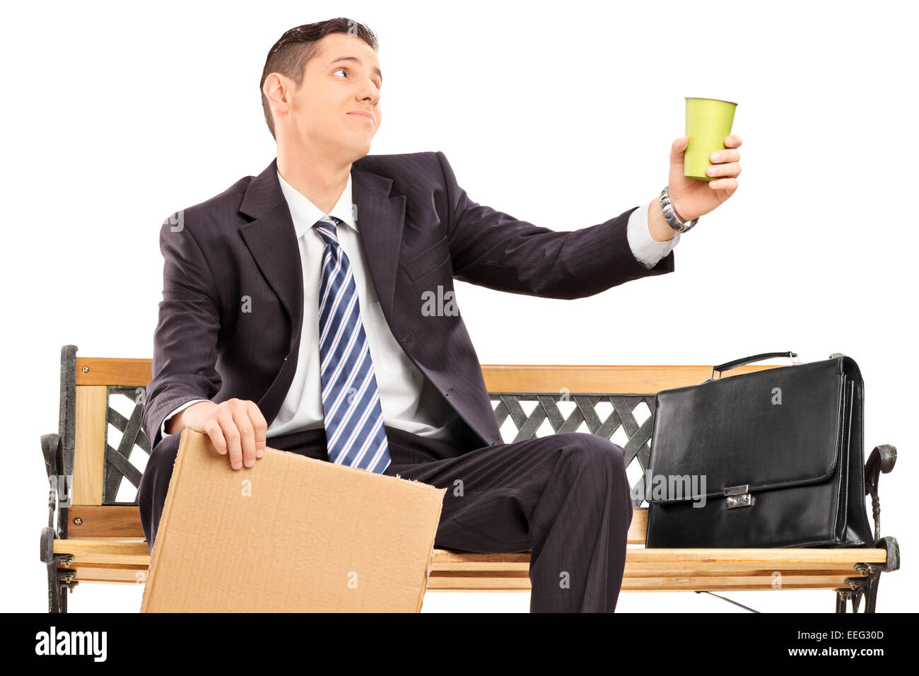 Homeless broke businessman sitting hi-res stock photography and images ...