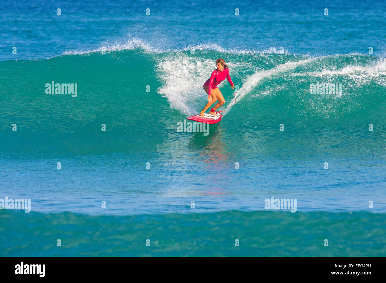 Surfer girl on wave indonesia hi-res stock photography and images - Alamy